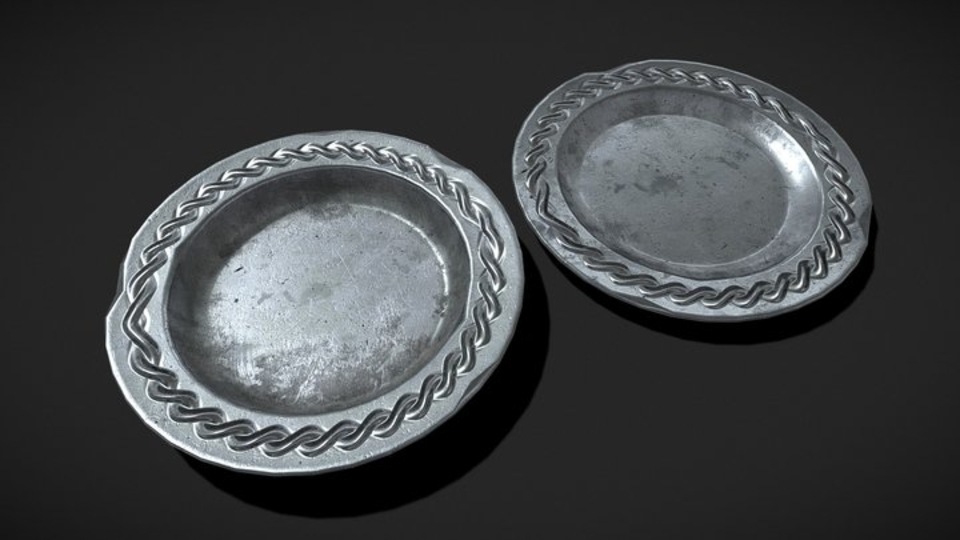 Pewter Ornamented Plates